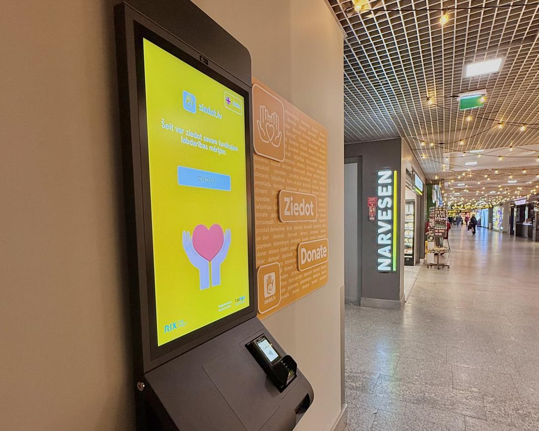 Digital Donation Stand Introduced at Riga Airport to Make Giving Easier ...